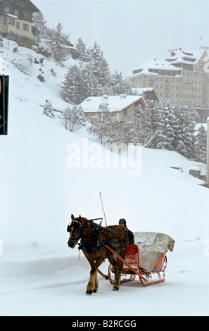 Horse drawn sleigh on a snow covered country road in winter, Eastern ...