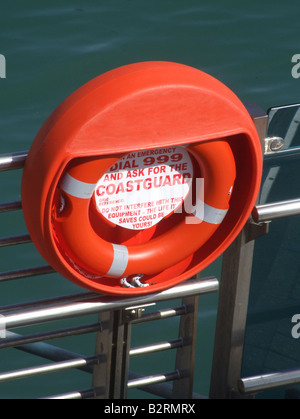 rubber ring at sos point in maritime port in uk Stock Photo - Alamy