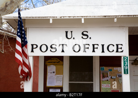 The front entrance of a small Post Office in an old building in the ...