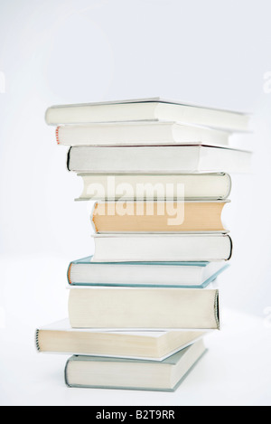 Tall piles of books Stock Photo - Alamy