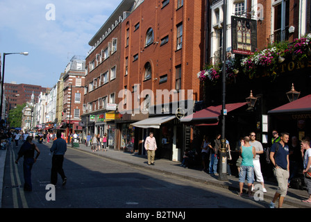 Old Compton Street, Soho, London. Artist: Herbert Felton Stock Photo ...