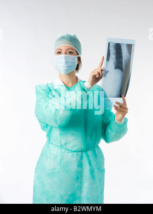 Doctor or nurse and patient with tomography CT or MRI Scan in hospital ...