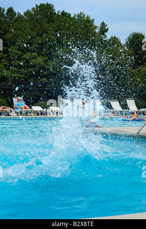Big water splash in Pool Stock Photo - Alamy