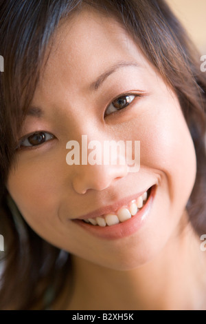 portrait of happy and smile asian female student with book in park of ...