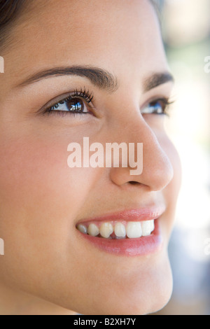 Young hispanic woman smiling happy standing at the city Stock Photo - Alamy