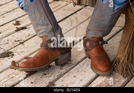 USA, Texas, Cowboy boots with spurs next to pickup truck tire Stock ...