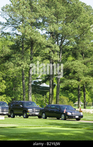 Black Presidential Limo and American Flag and motorcade pulling up in ...