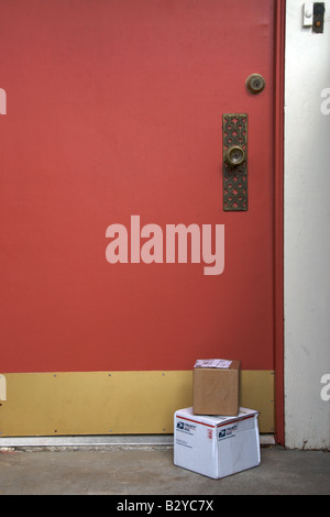 Parcels left at front door Stock Photo - Alamy