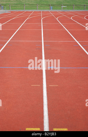 Running track with white stripe for athletics Stock Photo - Alamy