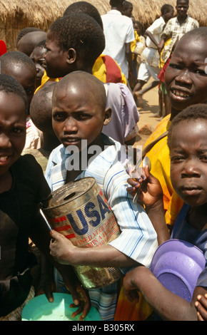 children queuing up in village school playground Stock Photo - Alamy