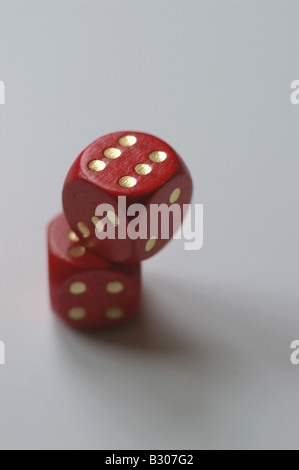 Stack of two die with both showing the six face Stock Photo - Alamy