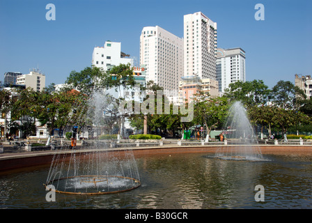Modern city skyline with high rise buildings and a coastal promenade ...