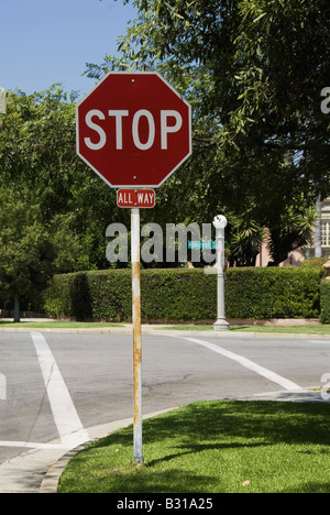 Stop Sign At Intersection Stock Photo - Alamy