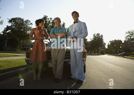 Father with prom couple Stock Photo - Alamy
