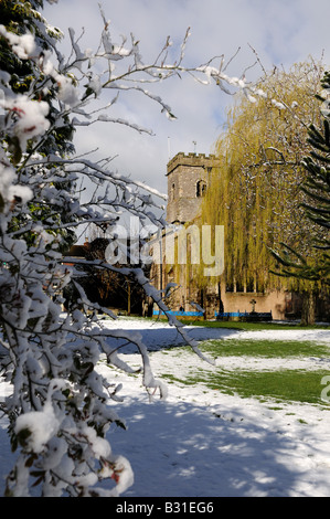 Snow covered trees and Holy Trinity Church seen from Lovers Walk a high ...