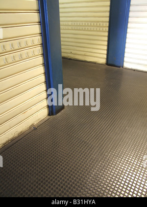 closed stalls at dark indoor shopping market Stock Photo - Alamy