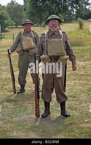 Home Guard soldiers stand to attention on parade at camp during 1940s ...