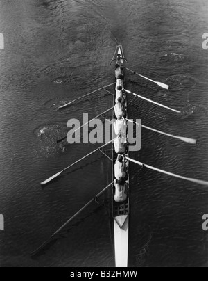 Overhead view of a female rowing crew in their racing shell, rowing ...