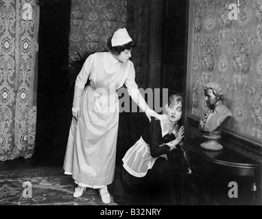 Woman caught eavesdropping at door Stock Photo - Alamy