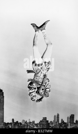 Man falling from skyscraper Stock Photo - Alamy