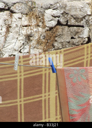 two blankets on washing line in sun outdoors Stock Photo - Alamy