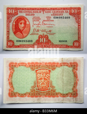 The front of a vintage ten shilling note from Great Britain on a white ...