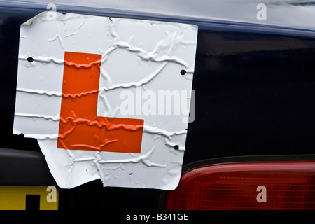 L plate on car - symbol for a learner driver Stock Photo - Alamy