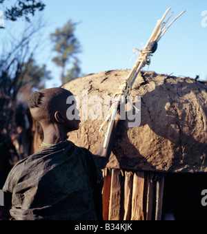 Kenya, Samburu District, Porro. Dressed in his black goatskin cloak, a ...