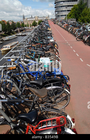 Mass bicycle storage for commuters at Amsterdam Central Station Holland ...