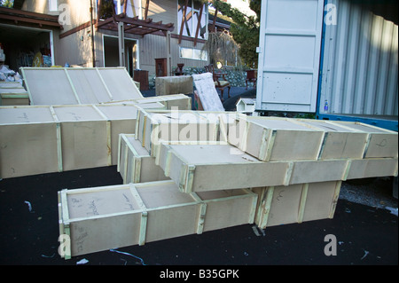 Unpacking large crates Stock Photo - Alamy