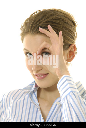beautiful young woman making ok or approval symbol with hand with blue ...