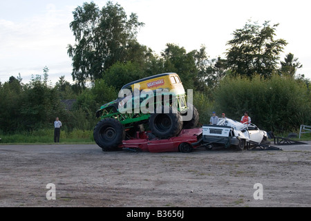Nightmare monster truck crushing cars Stock Photo - Alamy