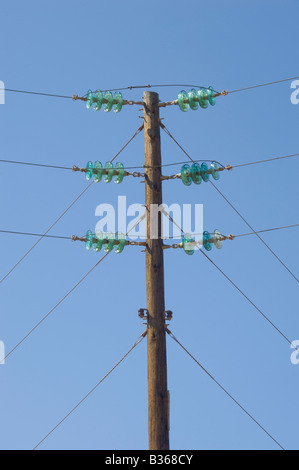 Glass insulator on the power line. Insulator of electrical high-voltage ...
