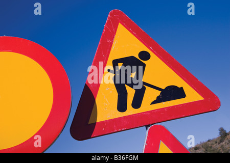 Warning signs, men at work road works traffic sign isolated over white background Stock Photo ...