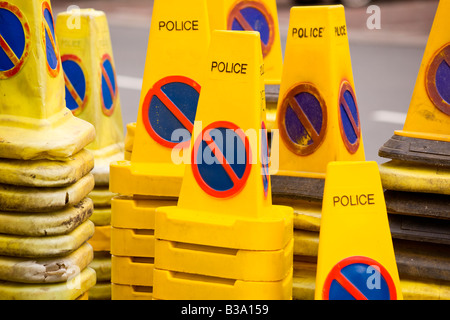 Yellow No Waiting or No Parking cones artfully arranged on ascending ...