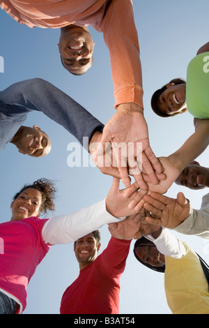 Happy group, below and huddle with hands together for teamwork, unity ...