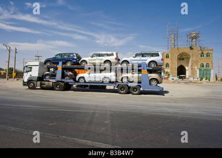 New Nissan SUVs Loaded on a Truck Near Yazd Iran Stock Photo - Alamy