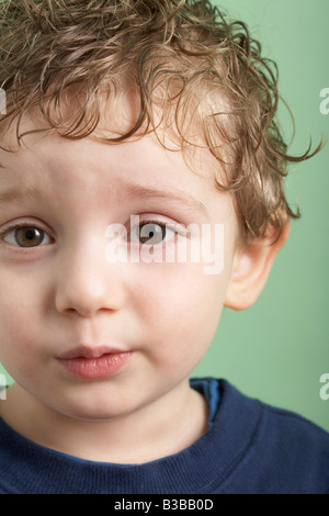 Little boy with quizzical facial expression Stock Photo - Alamy