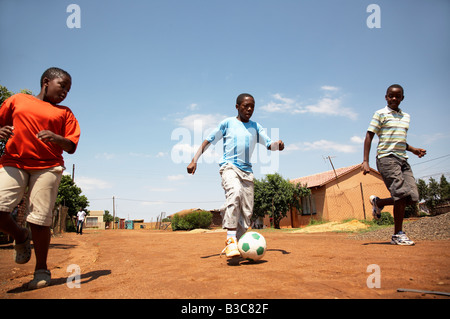african boys playing soccer Stock Photo - Alamy