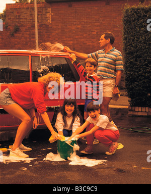 Happy family having fun time on picnic Stock Photo - Alamy