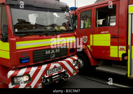 Fire brigade attending an incident at Cardigan west wales UK - woman ...