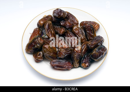 Halawi dates isolated on a white background. Halawi dates originate ...