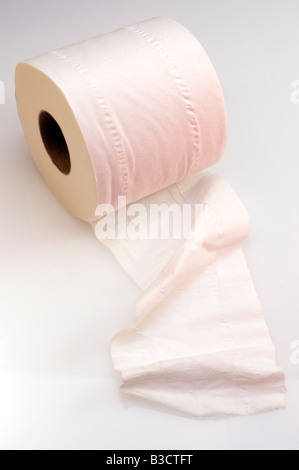 Closeup of a toilet paper roll on a black background Stock Photo - Alamy