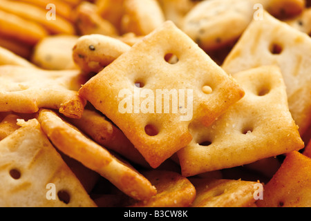 close up photo of biscuit cracker over the wooden plate, fork and spoon ...
