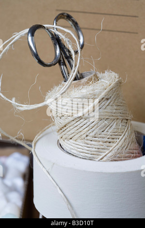 Closeup shot of scissors adhesive tape and a utility knife Stock Photo ...