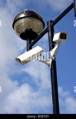 A Security CCTV Cameras on a lamp post Stock Photo - Alamy