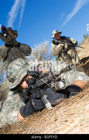 Soldiers aiming machine guns Stock Photo - Alamy