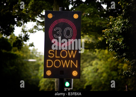 30 miles per hour speed limit sign at the entrance to the village of ...