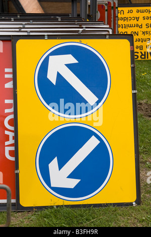 Vehicles may pass either side to reach same destination road sign on ...