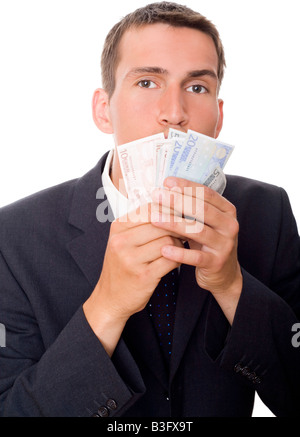 Man kissing banknotes Stock Photo - Alamy
